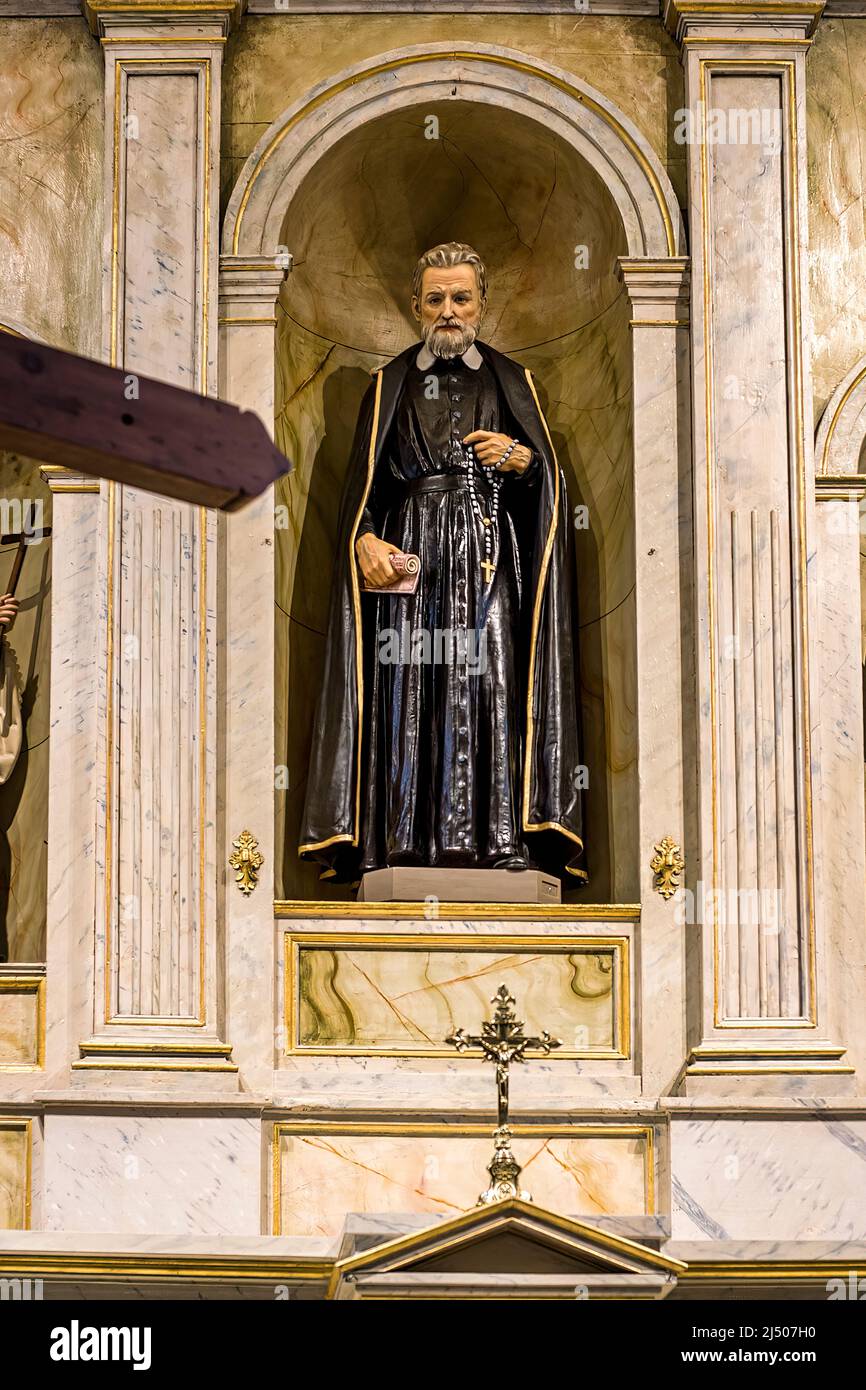 Statue of St. Philip de Neri above the high altar of the San Felipe de ...