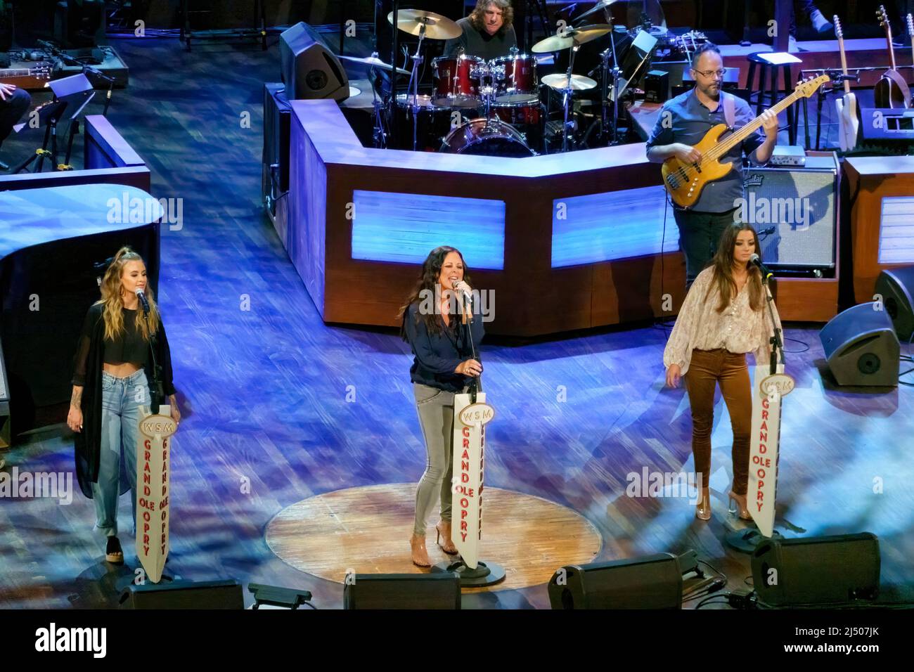 Sara Evans performs with her daughters on the stage of The Grand Ole ...