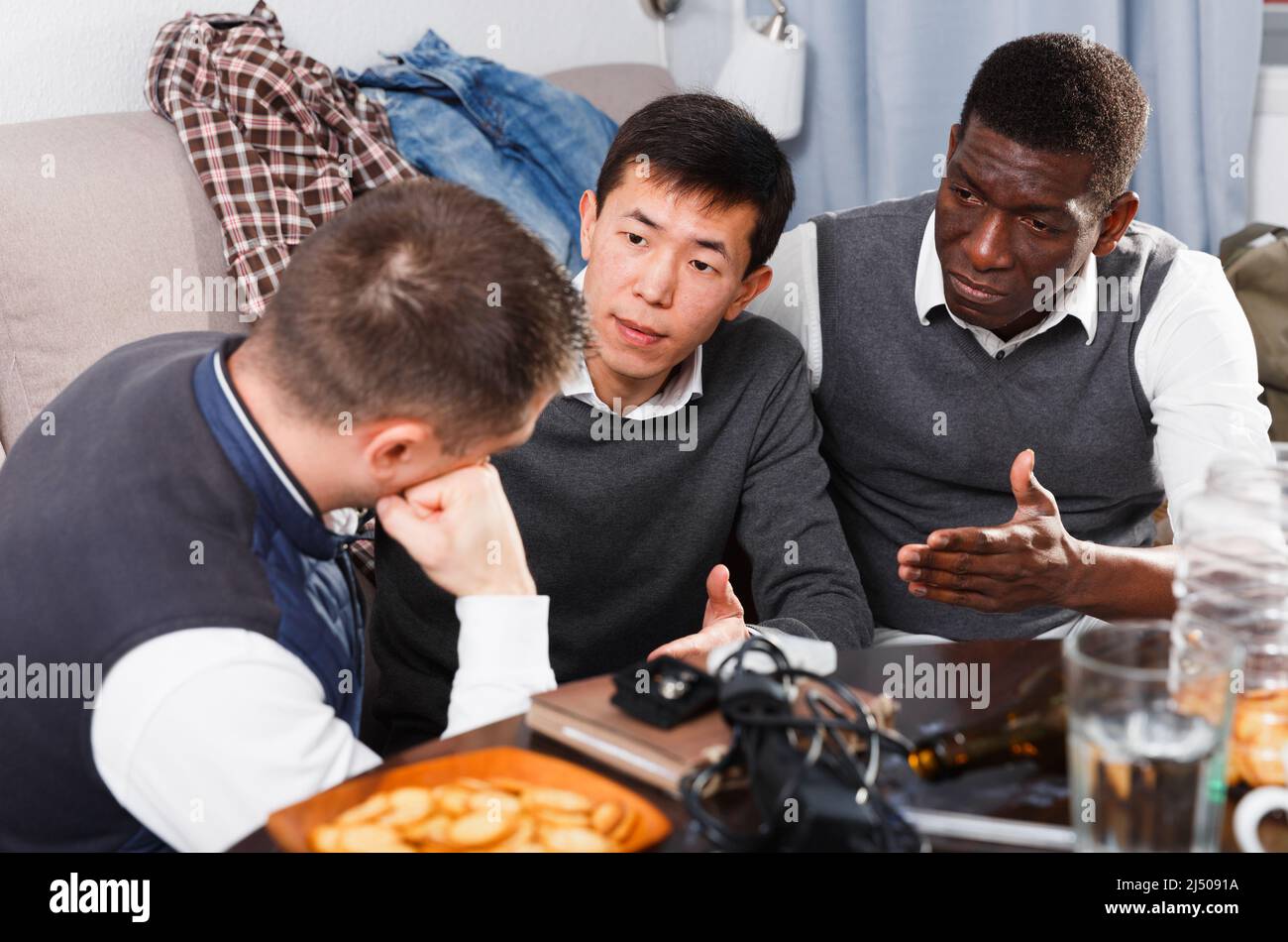 Two friends are talking about life and supporting sad man Stock Photo ...