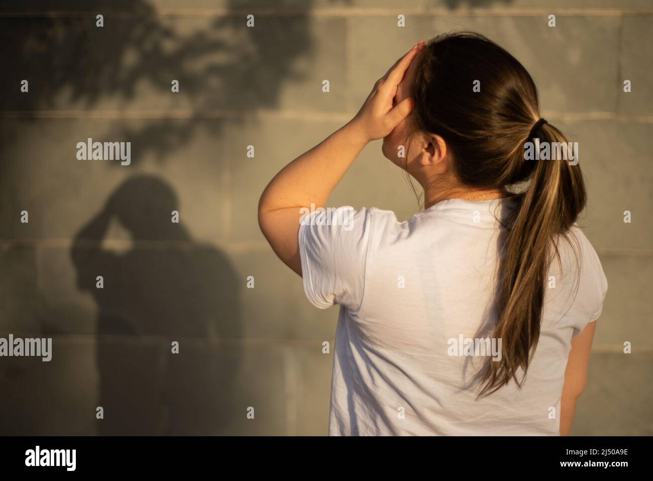 Young female health related poses with shadows Stock Photo - Alamy