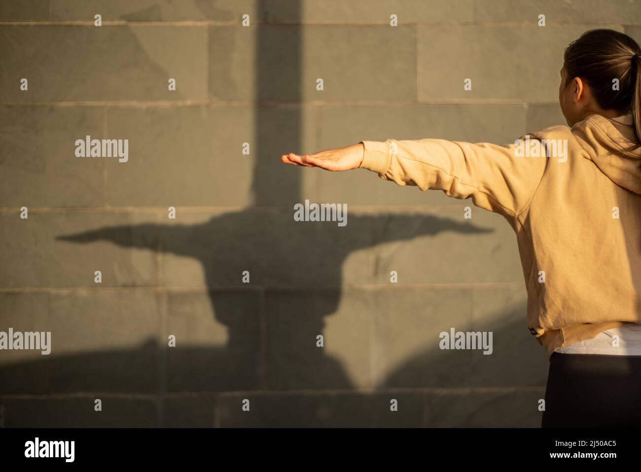 Young female health related poses with shadows Stock Photo - Alamy