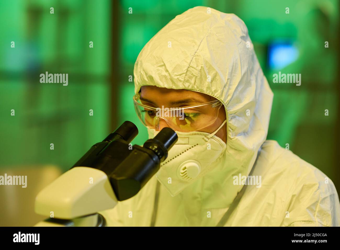 Female researcher in protective suit hi-res stock photography and ...