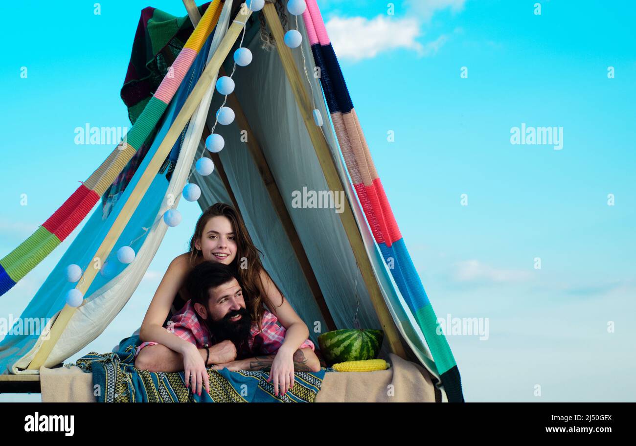 Couple on camping in tent . Young coupl at countryside camping. Couple ...