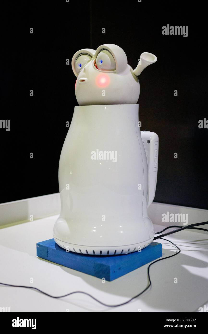 Emotional white robot, similar to an electric kettle, at the exhibition ...
