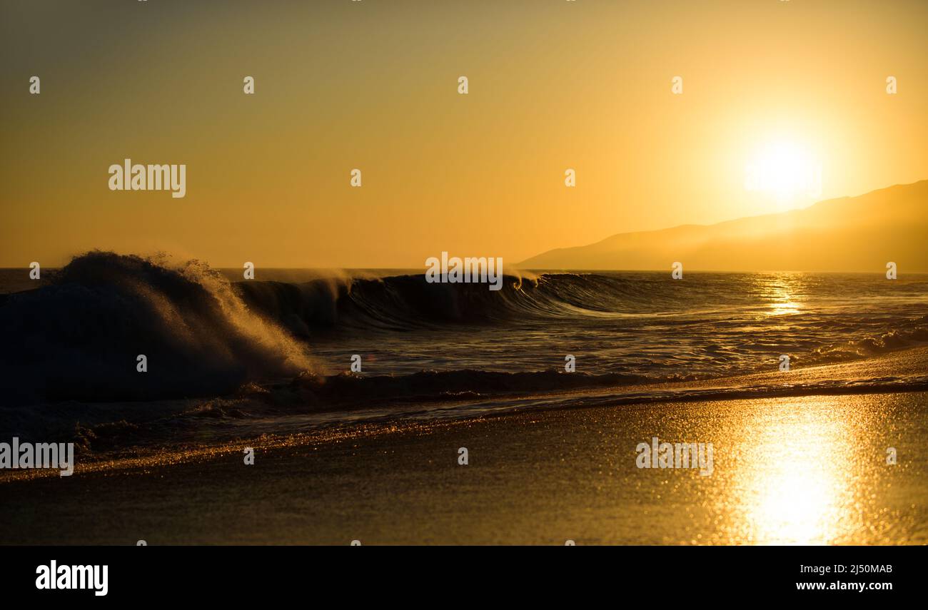 Gold sky and ocean water. Abstract background with sunset and ocean ...