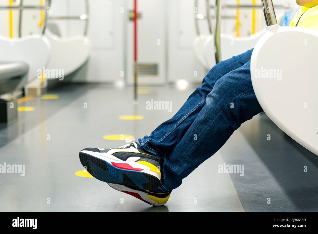 Man sitting on seat railway hi-res stock photography and images - Alamy