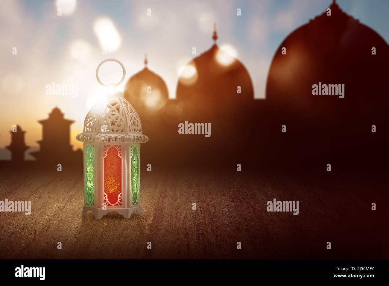 Arabic lamp with colorful light with blurred light background Stock ...