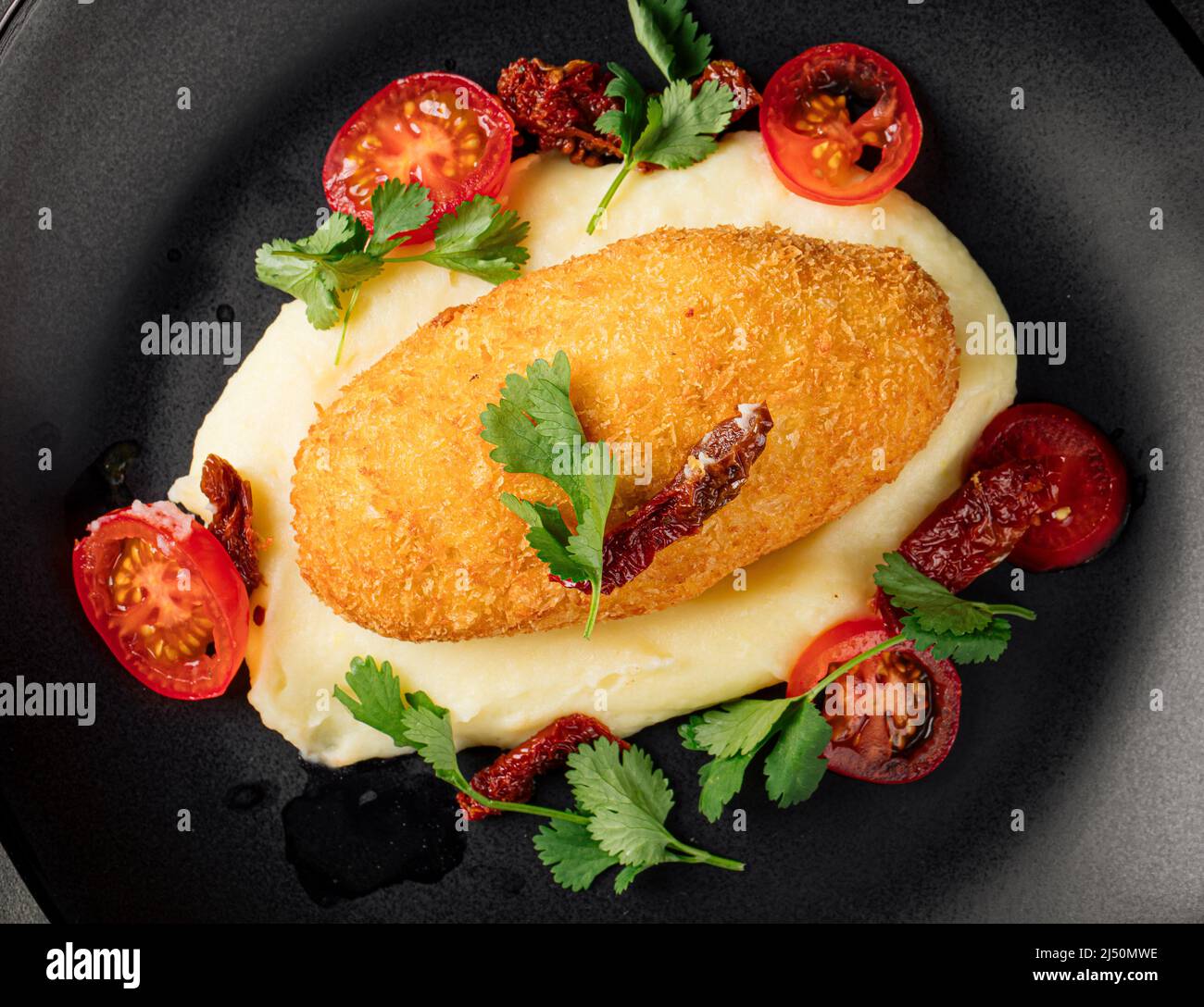 Chicken kiev cutlet with mashed potato Stock Photo - Alamy