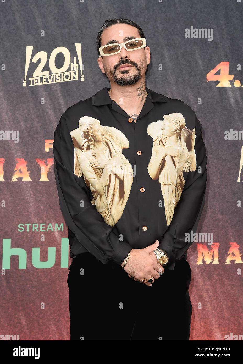 Gino Vento walking on the red carpet at FX's "Mayans M.C." season 4 ...