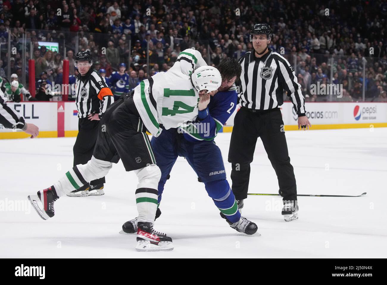 Dallas Stars Jamie Benn 14 And Vancouver Canucks Luke Schenn 2 Fight During The Second