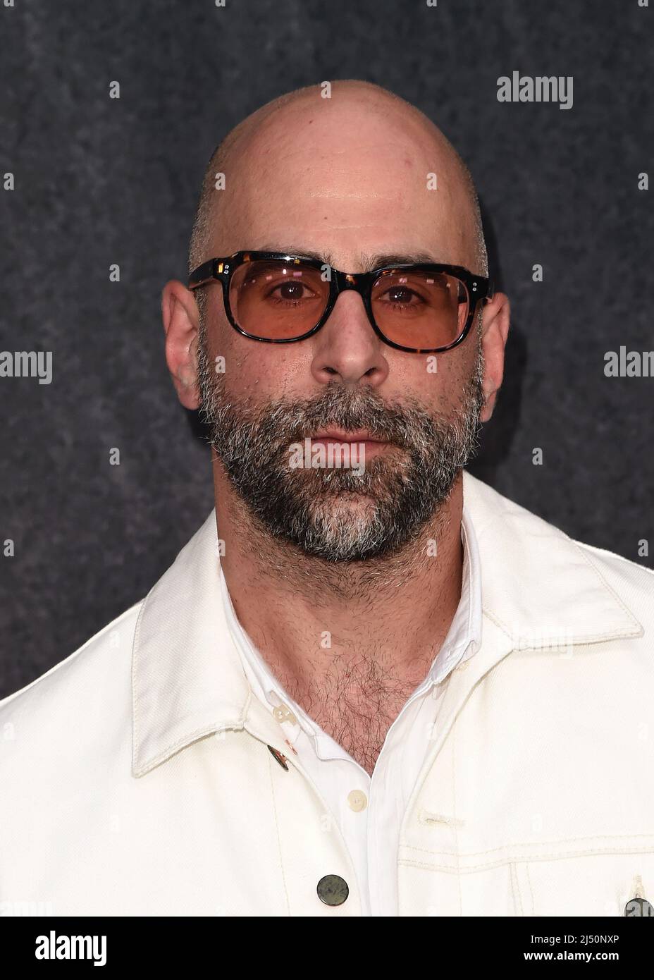 Greg Vrotsos walking on the red carpet at FX's "Mayans M.C." season 4 ...