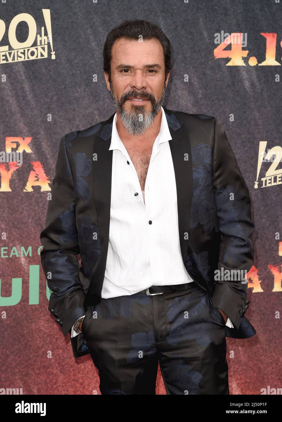 Michael Irby walking on the red carpet at FX's "Mayans M.C." season 4 ...