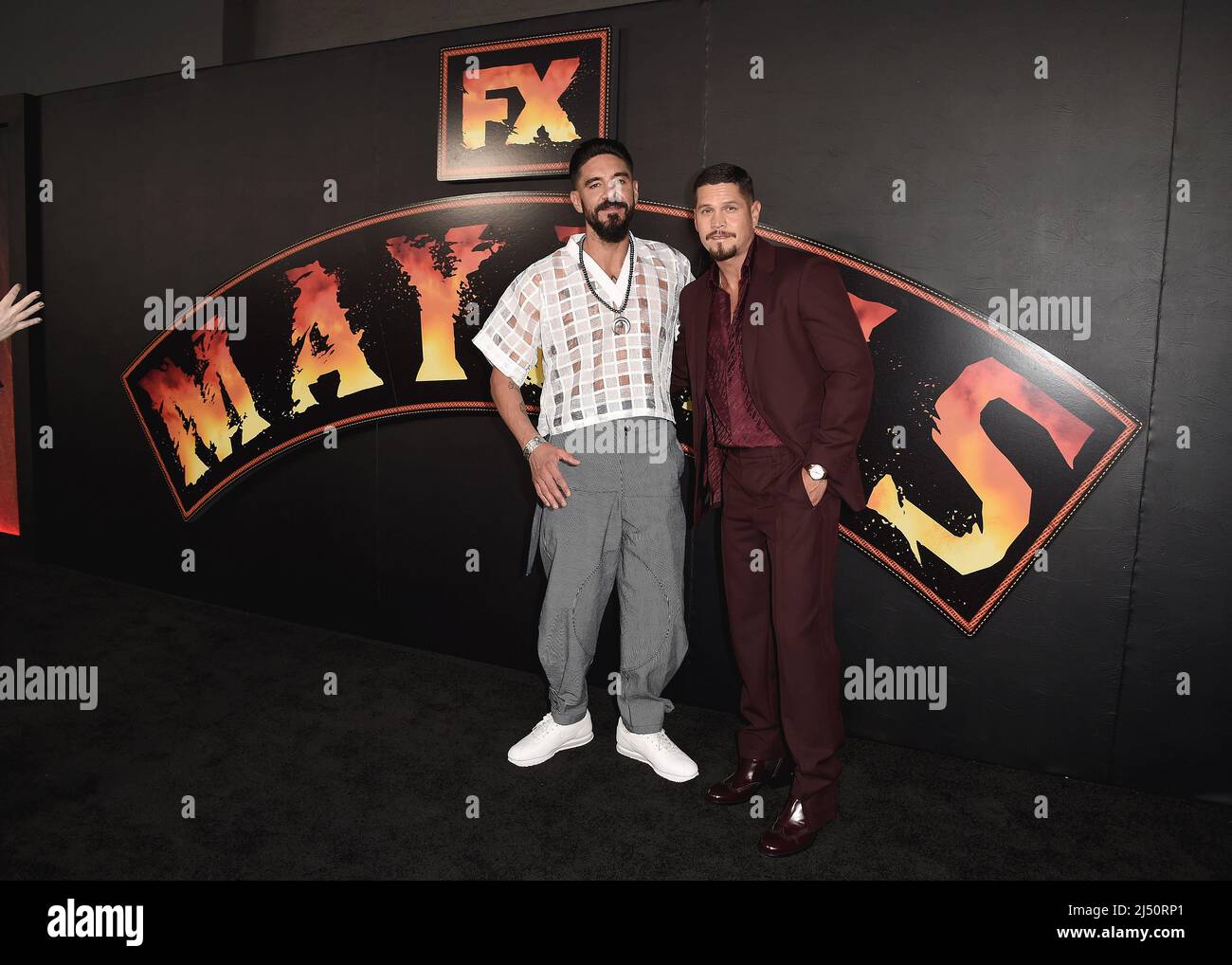 Clayton Cardenas and JD Pardo walking on the red carpet at FX's "Mayans ...