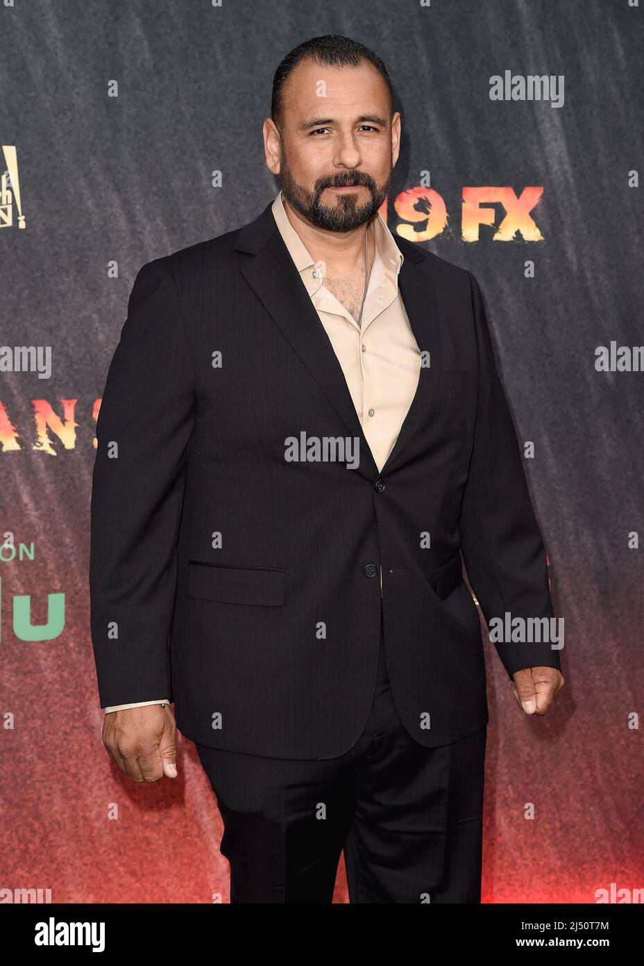 Michael Perez walking on the red carpet at FX's "Mayans M.C." season 4 ...