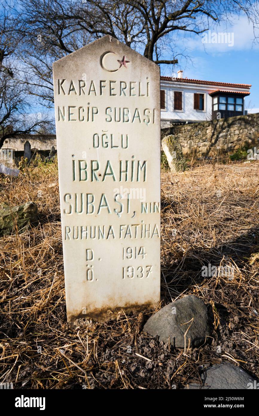 An old, traditional, stone headstone, grave behind the Memiş mosque. In ...