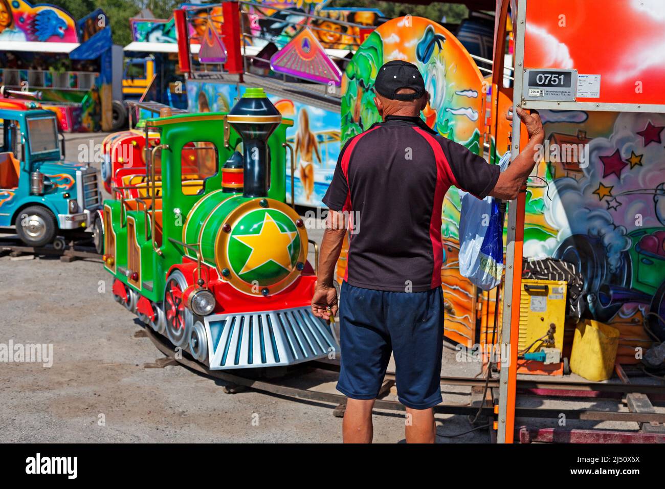 Umea, Norrland Sweden - June 29, 2021: elderly man taking care of ride ...