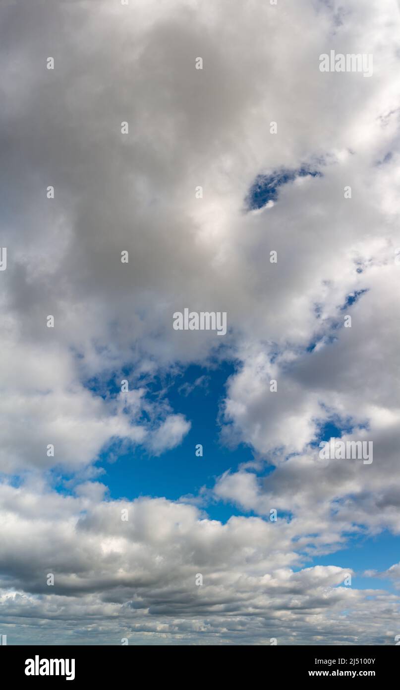 Fantastic soft thunderclouds, natural sky composition, vertical ...