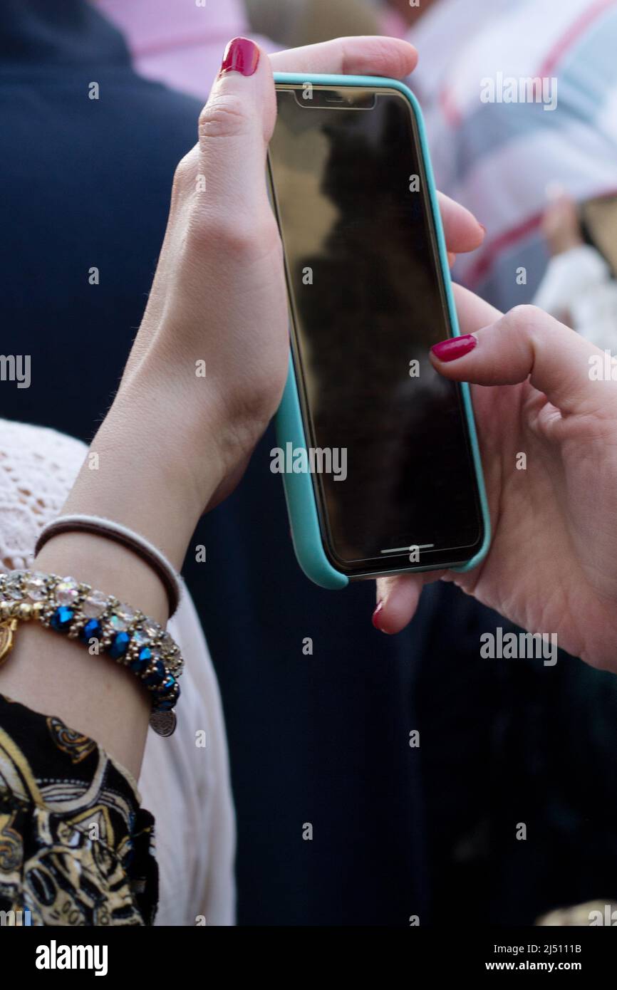 People using technology in a crowd hi-res stock photography and images ...