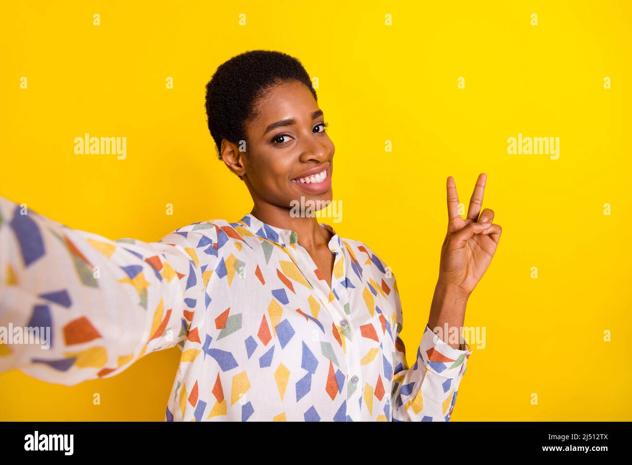 Photo of friendly positive person make selfie hand demonstrate v-sign ...