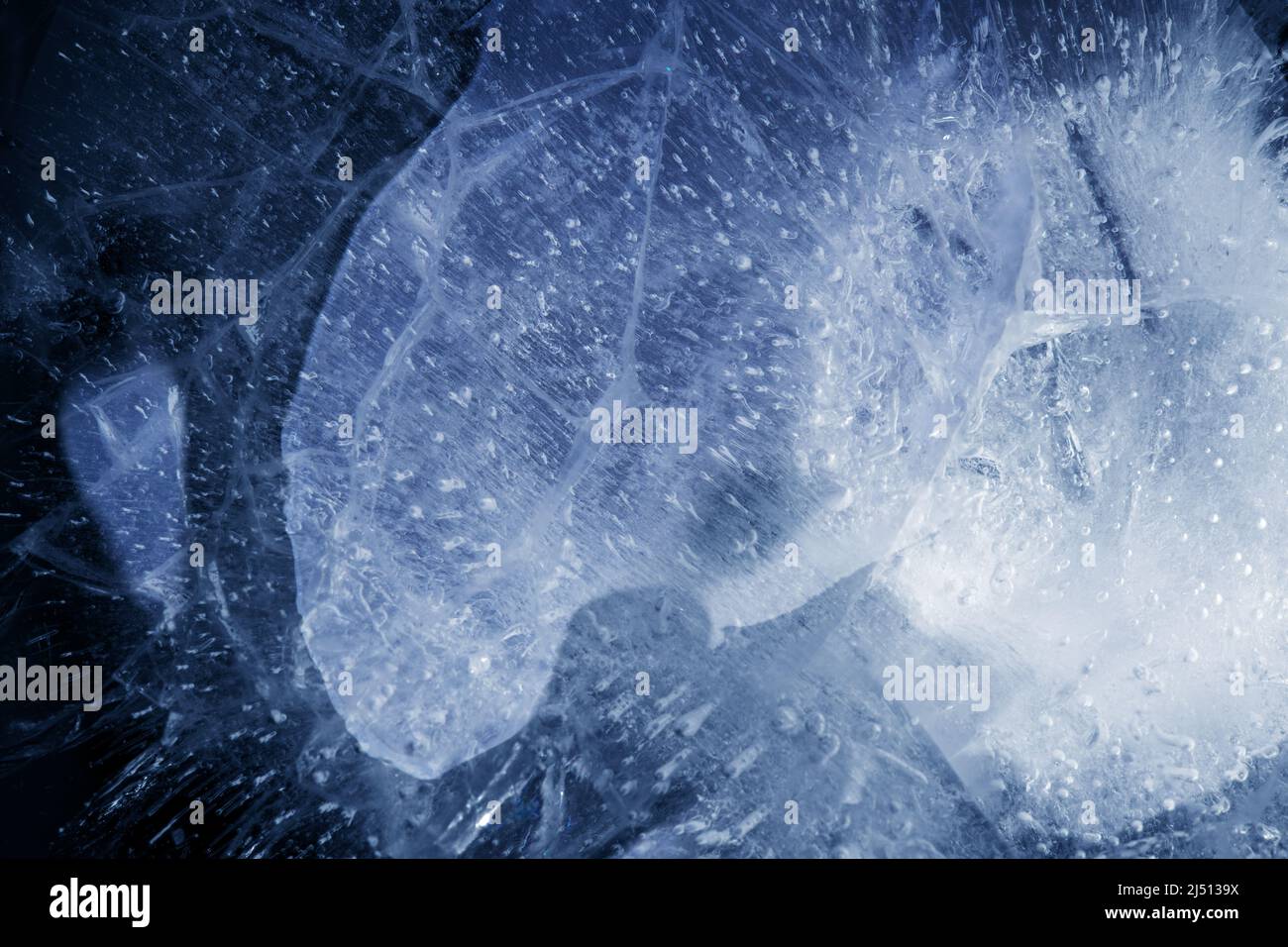 beautiful blue ice with cracks. frosty texture Stock Photo - Alamy