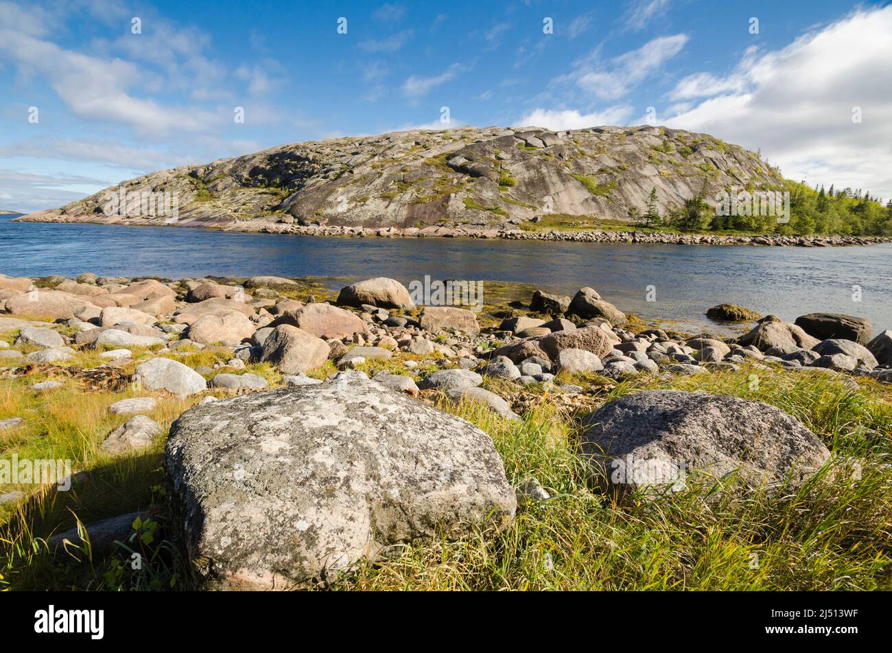 Huge stone cliffs. Gray granite. Republic of Karelia, Kemsky skerries ...