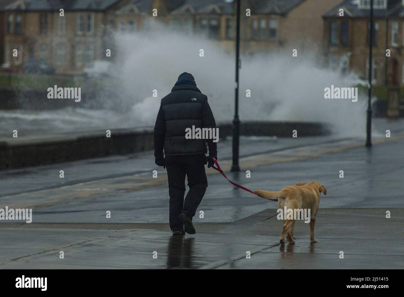 Waves are seen coming over the promonade at west coast Scottish town ...