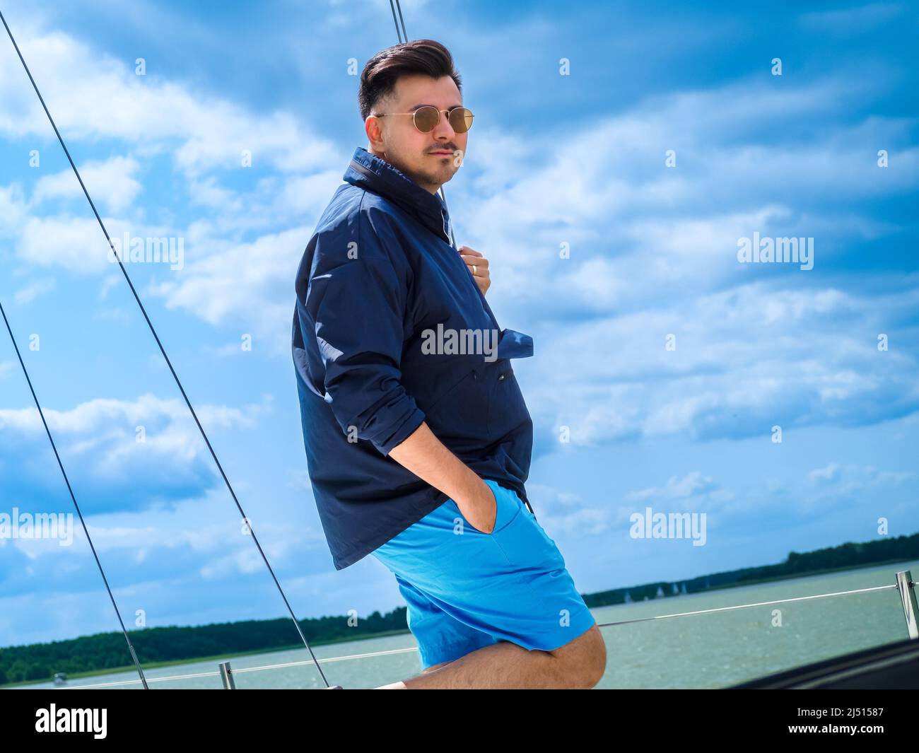 young black hair man wear in sunglasses and nautical cloth standing on ...