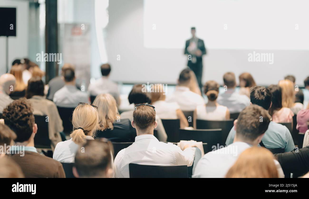 Business speaker giving a talk at business conference event Stock Photo ...