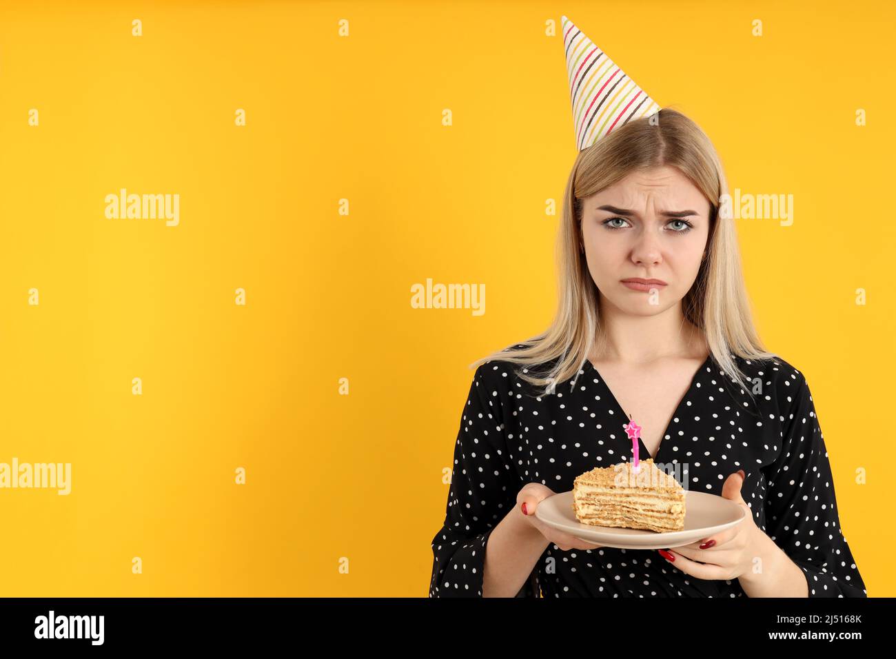 Sad woman celebrating birthday hi-res stock photography and images - Alamy