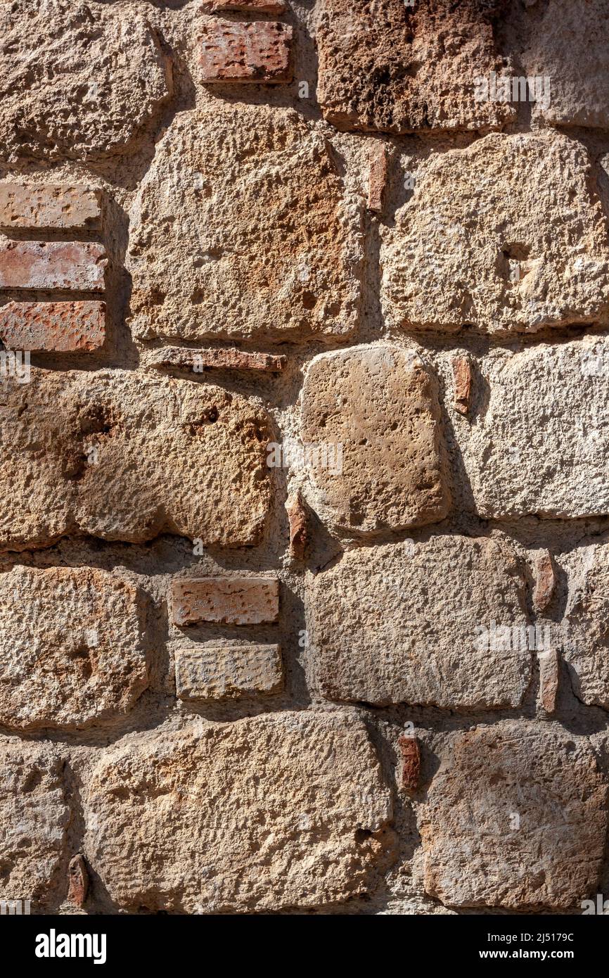 Antique closeup of old blocks of different sizes and mortars Stock ...