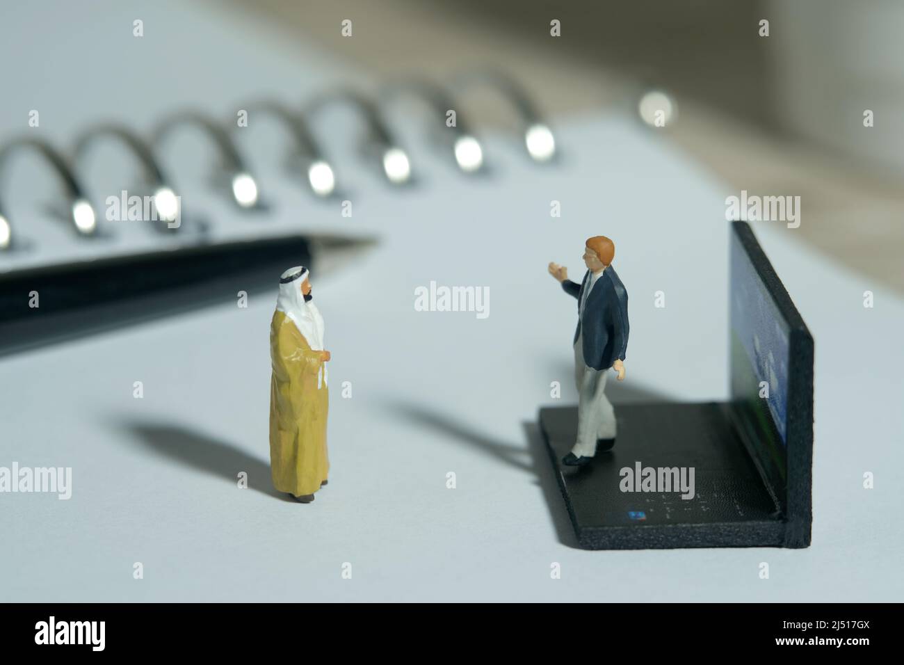 Miniature people toy figure photography. Business presentation meeting ...