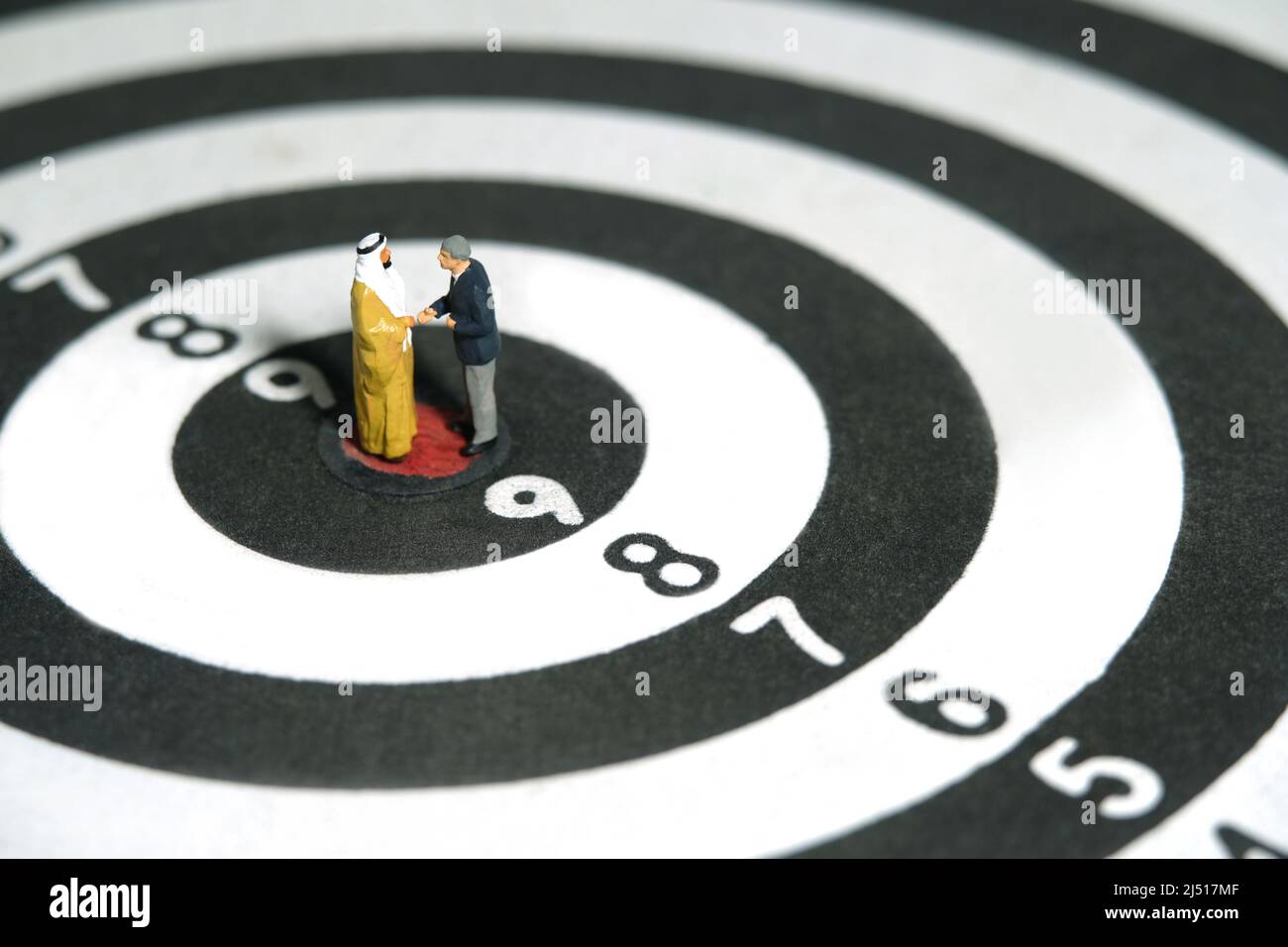 Miniature people toy figure photography. Partnership concept. High view ...