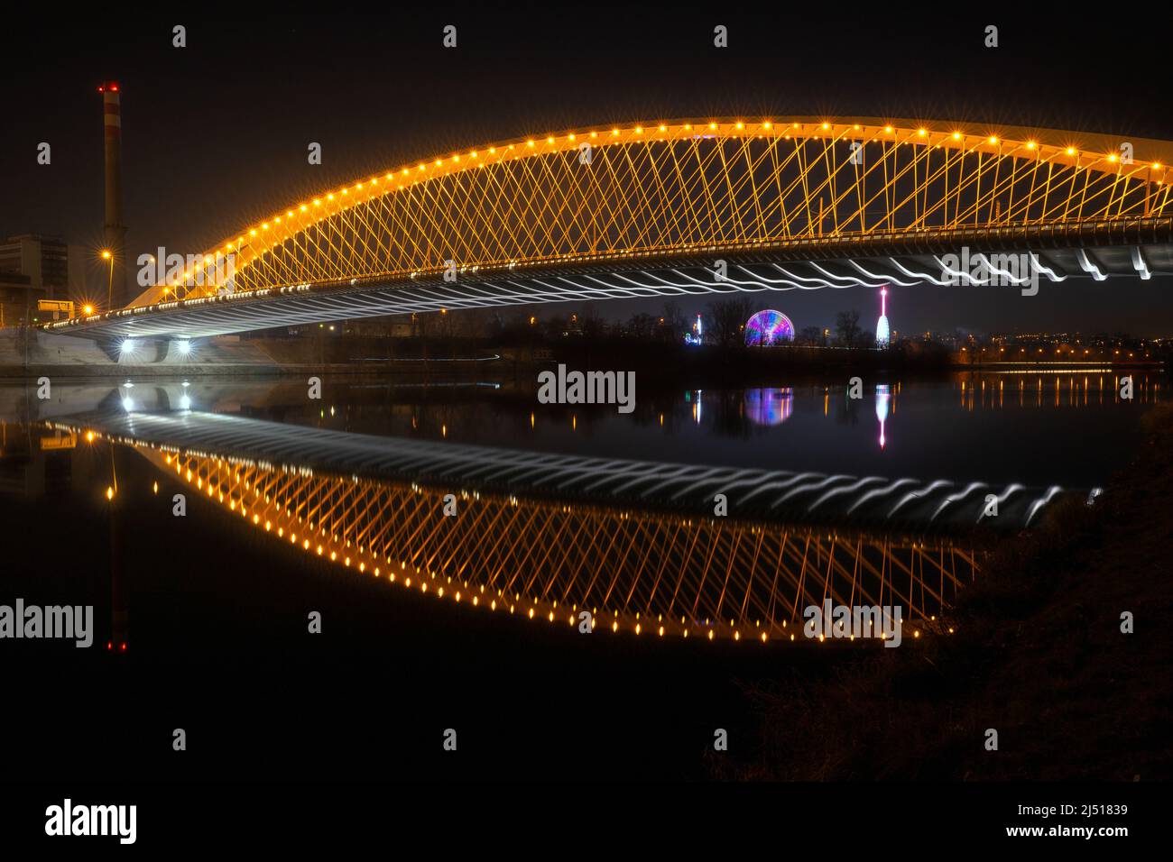 Troja bridge in Prague shining into the night with thousands of bulbs ...