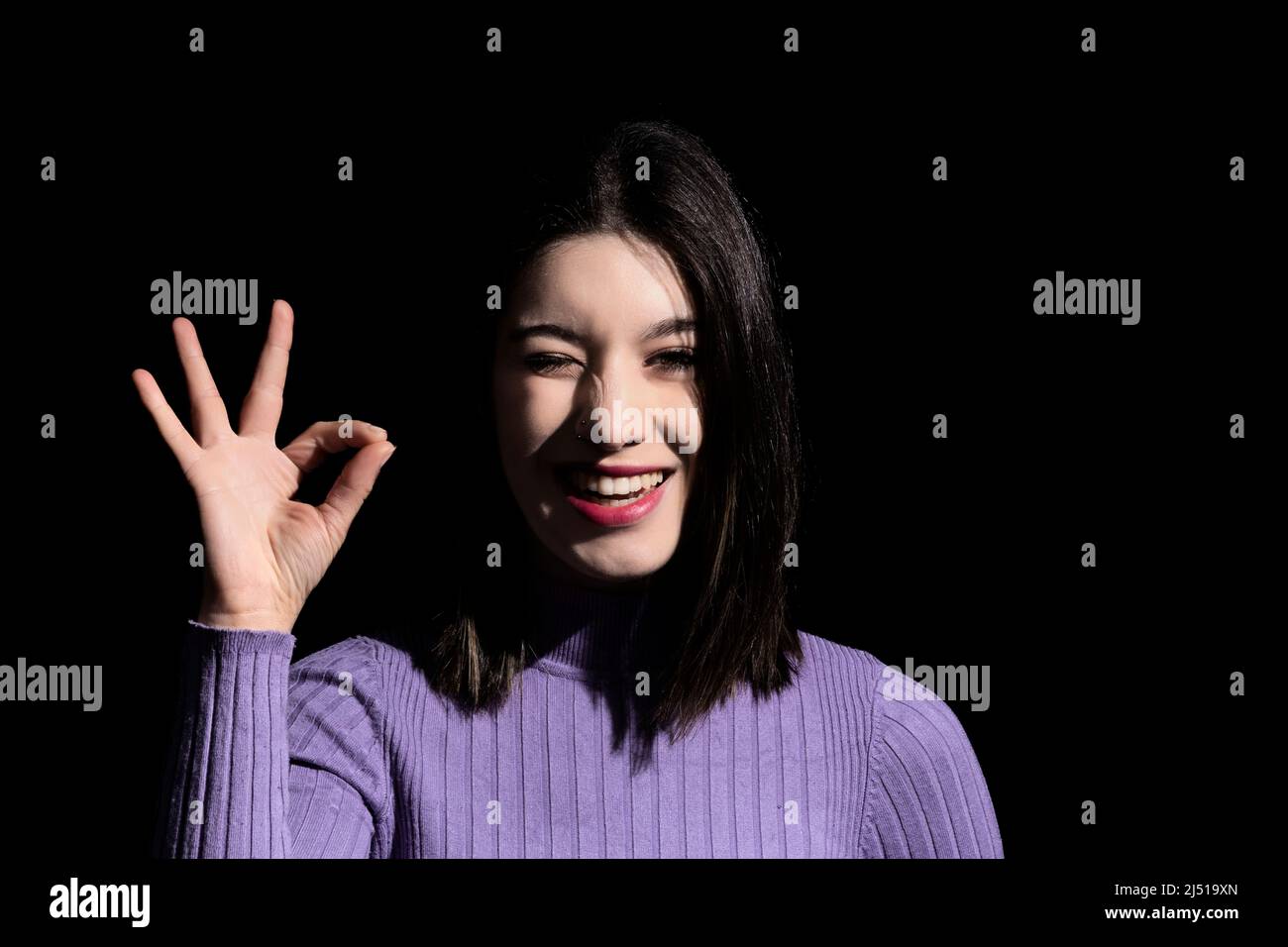 Person doing ok hand signal hi-res stock photography and images - Alamy