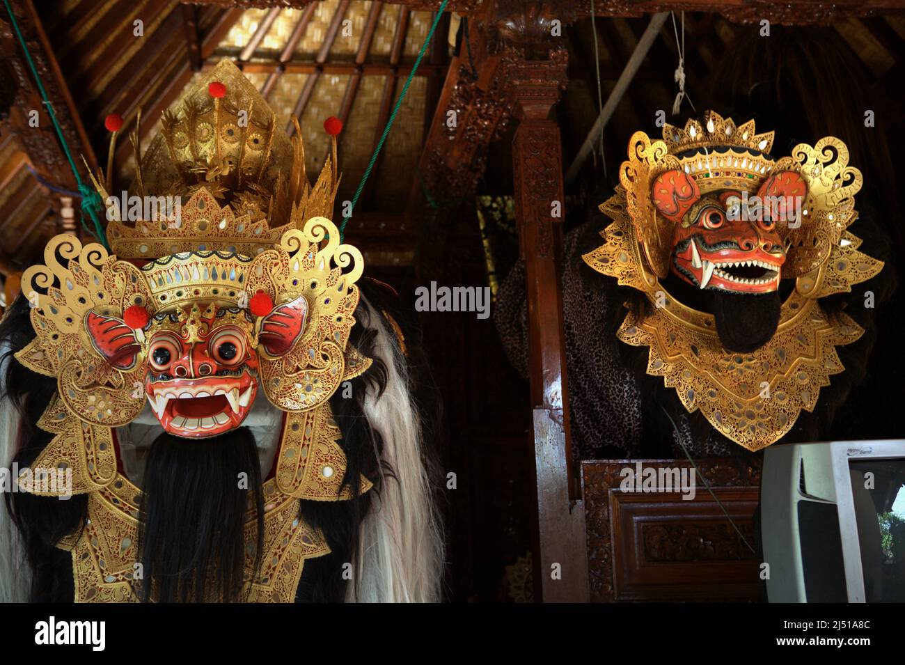 A "rangda" (demon queen, left) and a "barong" (panther-like creature ...