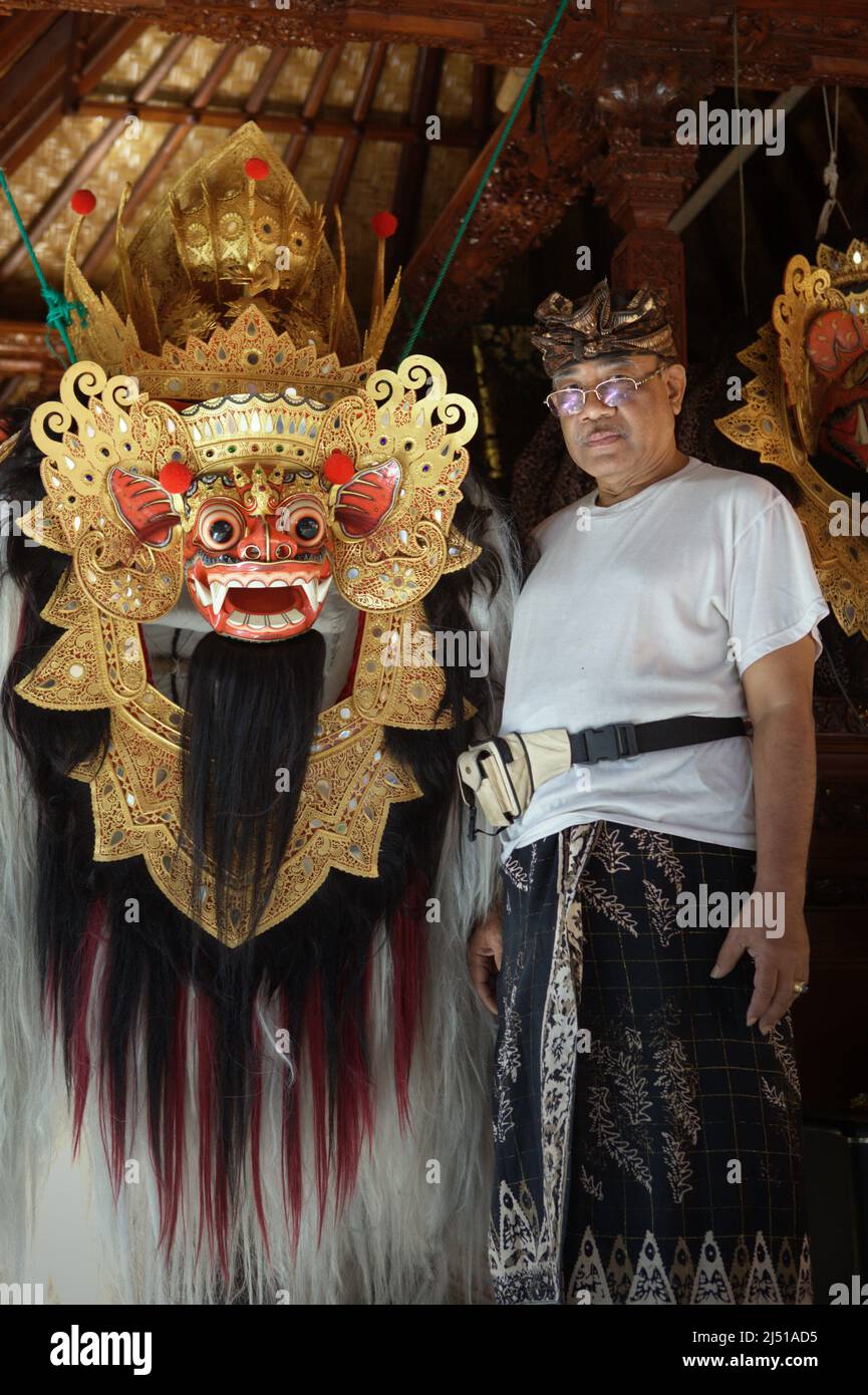 Balinese artist I Wayan Murdana poses with his creation of "rangda ...