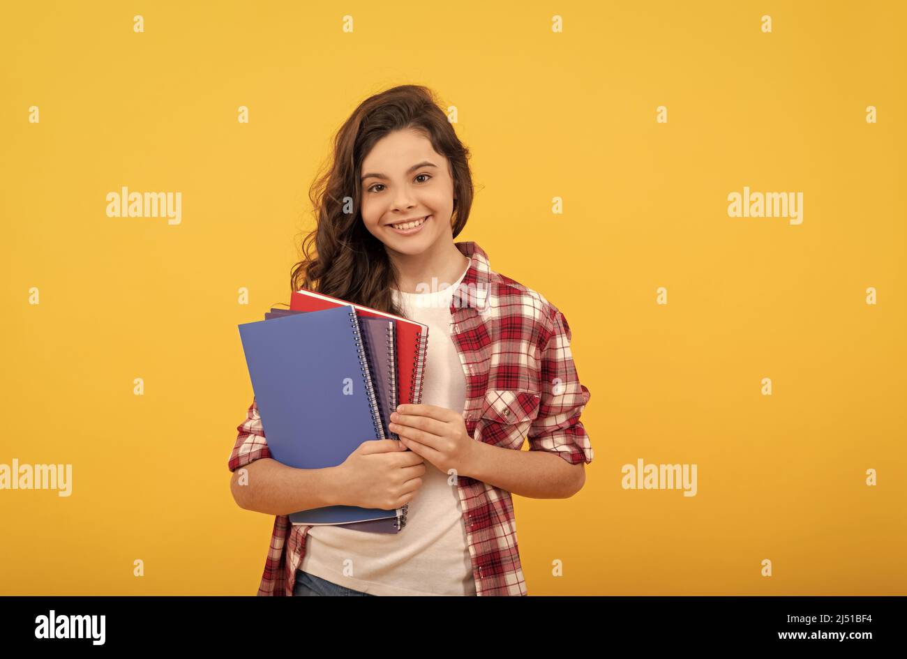 smiling school child ready to study with copybooks, knowledge Stock ...