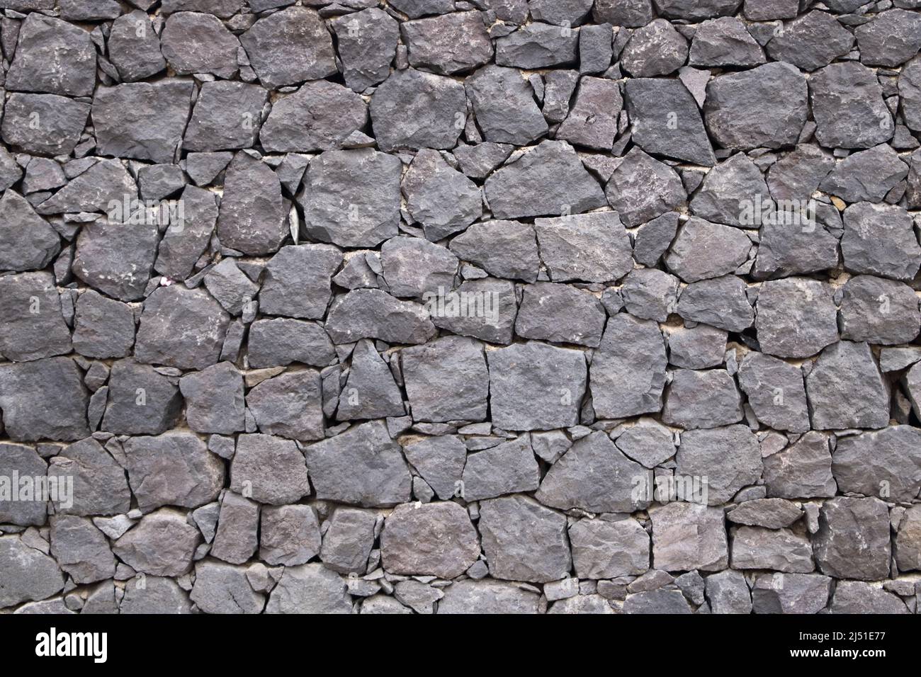 a Gray stone wall texture pattern background Stock Photo - Alamy