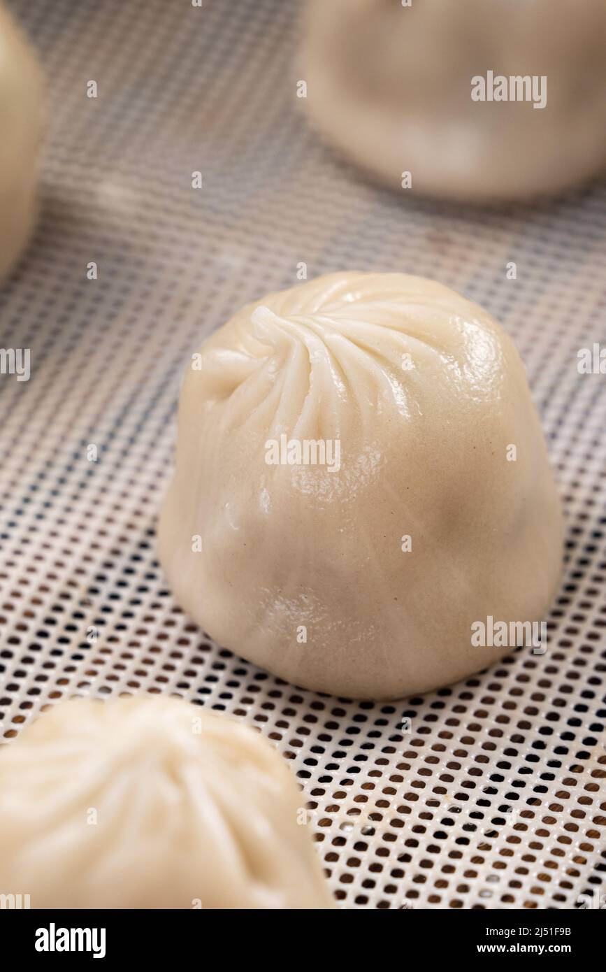 Steamed pork soup dumplings named Xiao long bao in Taiwan, Taiwanese ...