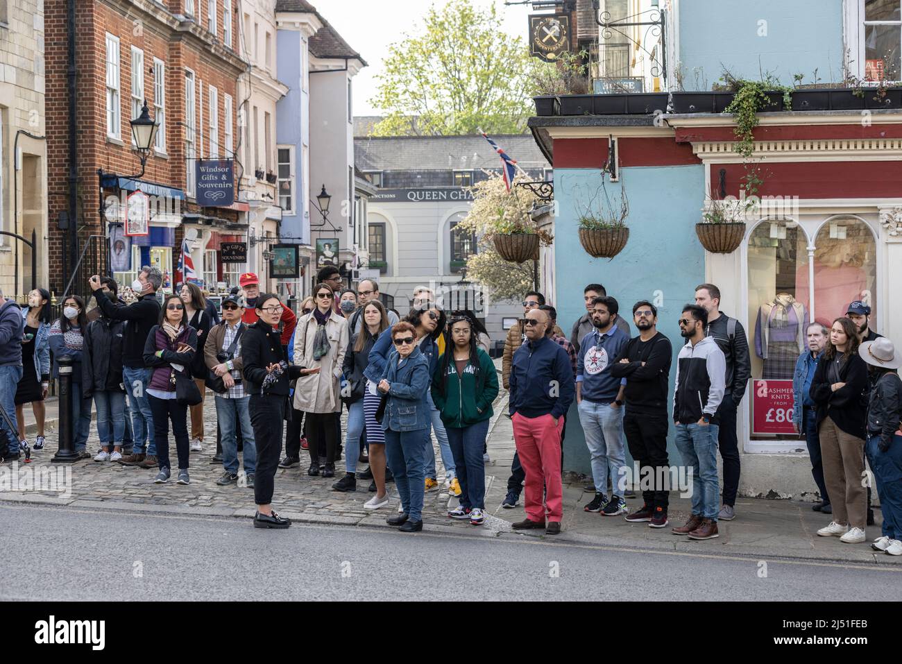 Tourists enjoy the atmosphere in Windsor on the Royal Family attend the ...