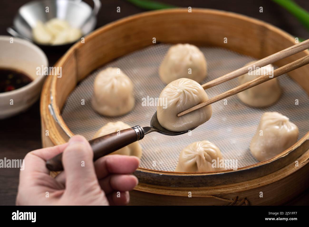 Steamed pork soup dumplings named Xiao long bao in Taiwan, Taiwanese ...