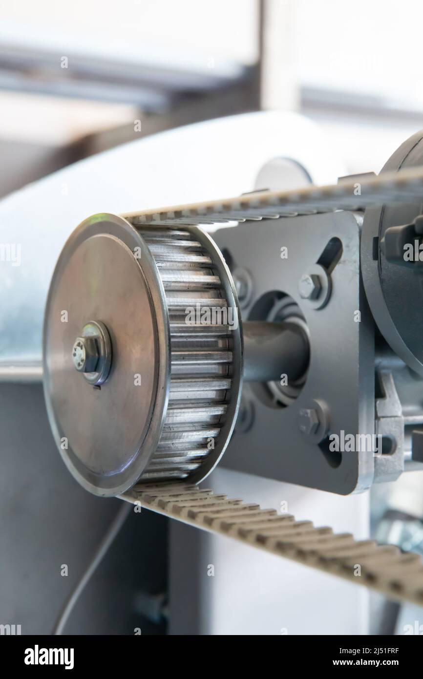 Industrial machine engine gear wheel Stock Photo - Alamy