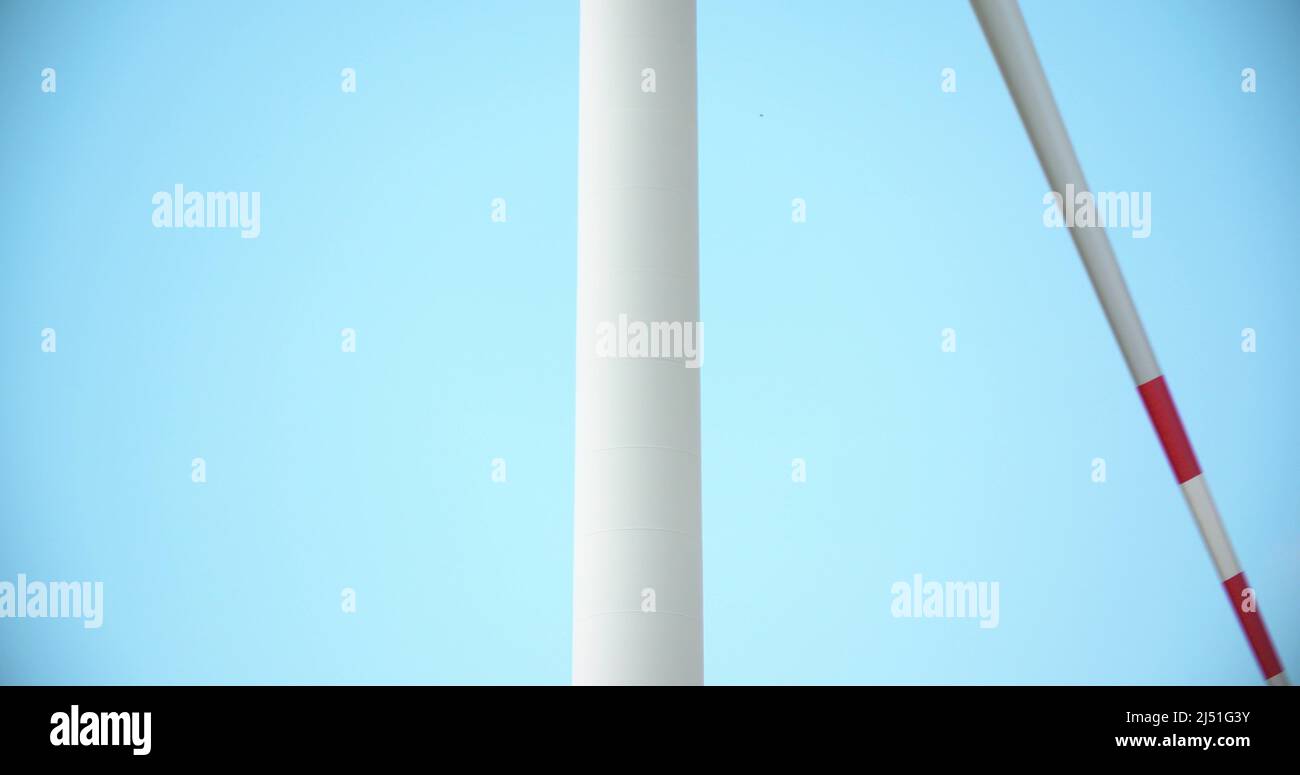 Windmill spinning against sky Stock Photo - Alamy