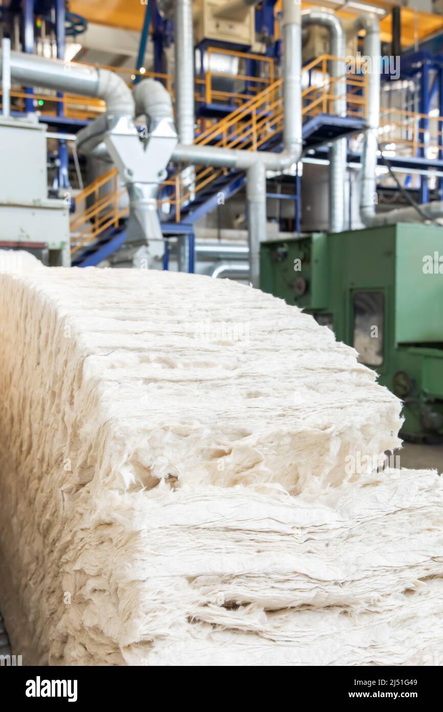Pile or stack of cotton bales on the machine at industrial cotton ...
