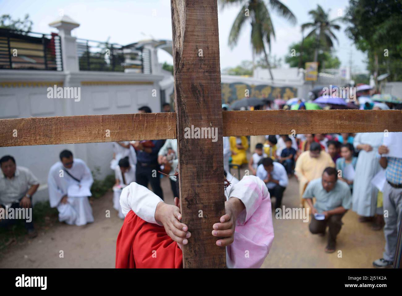 Christian devotees take part in the re-enactment of the crucifixion of ...