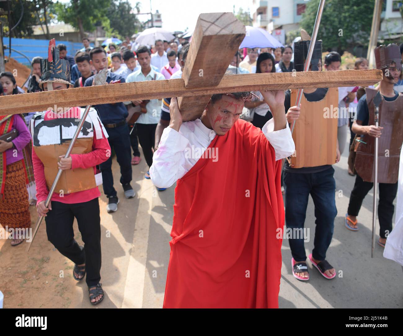 Christian devotees take part in the re-enactment of the crucifixion of ...