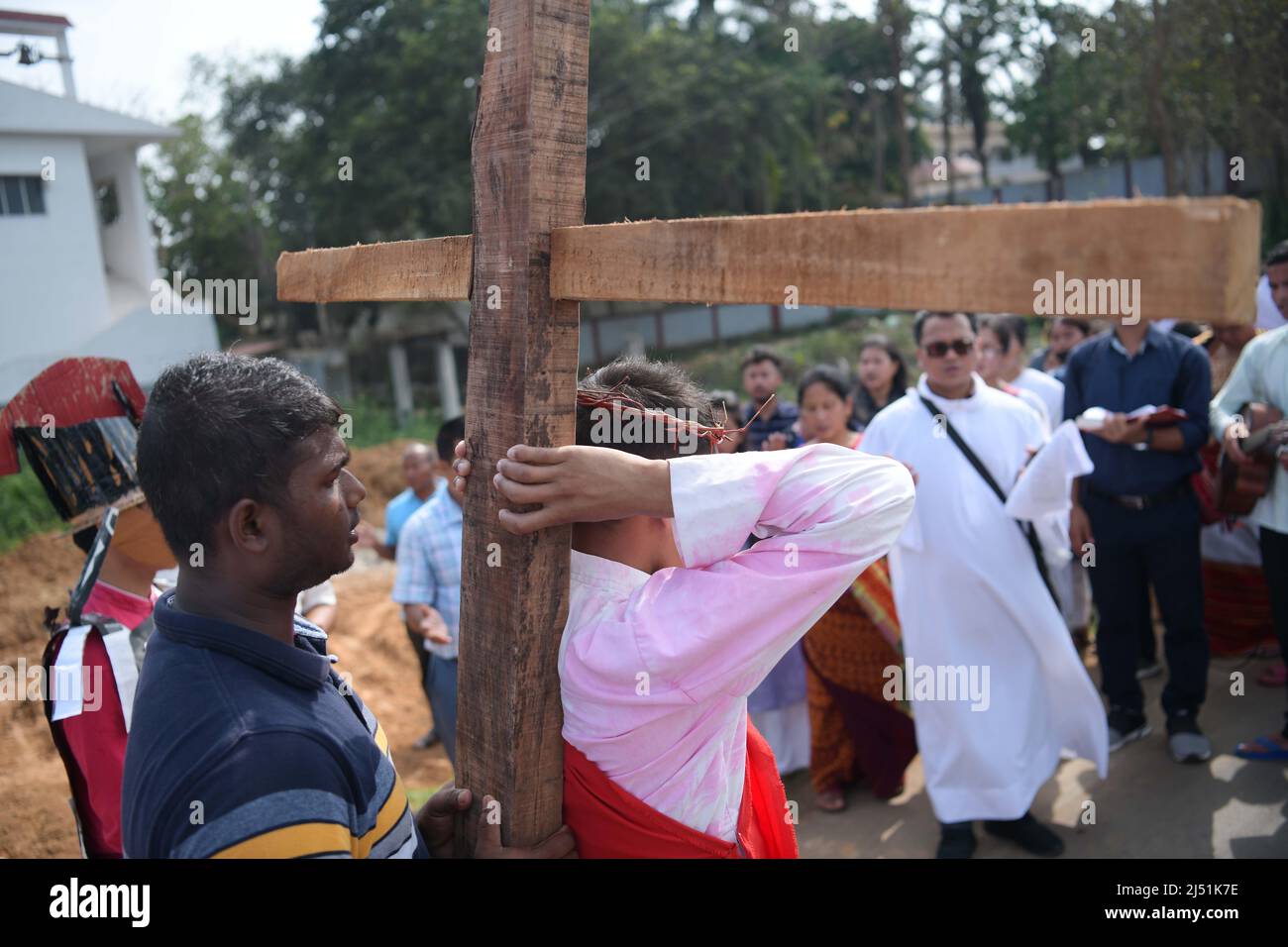 Christian devotees take part in the re-enactment of the crucifixion of ...