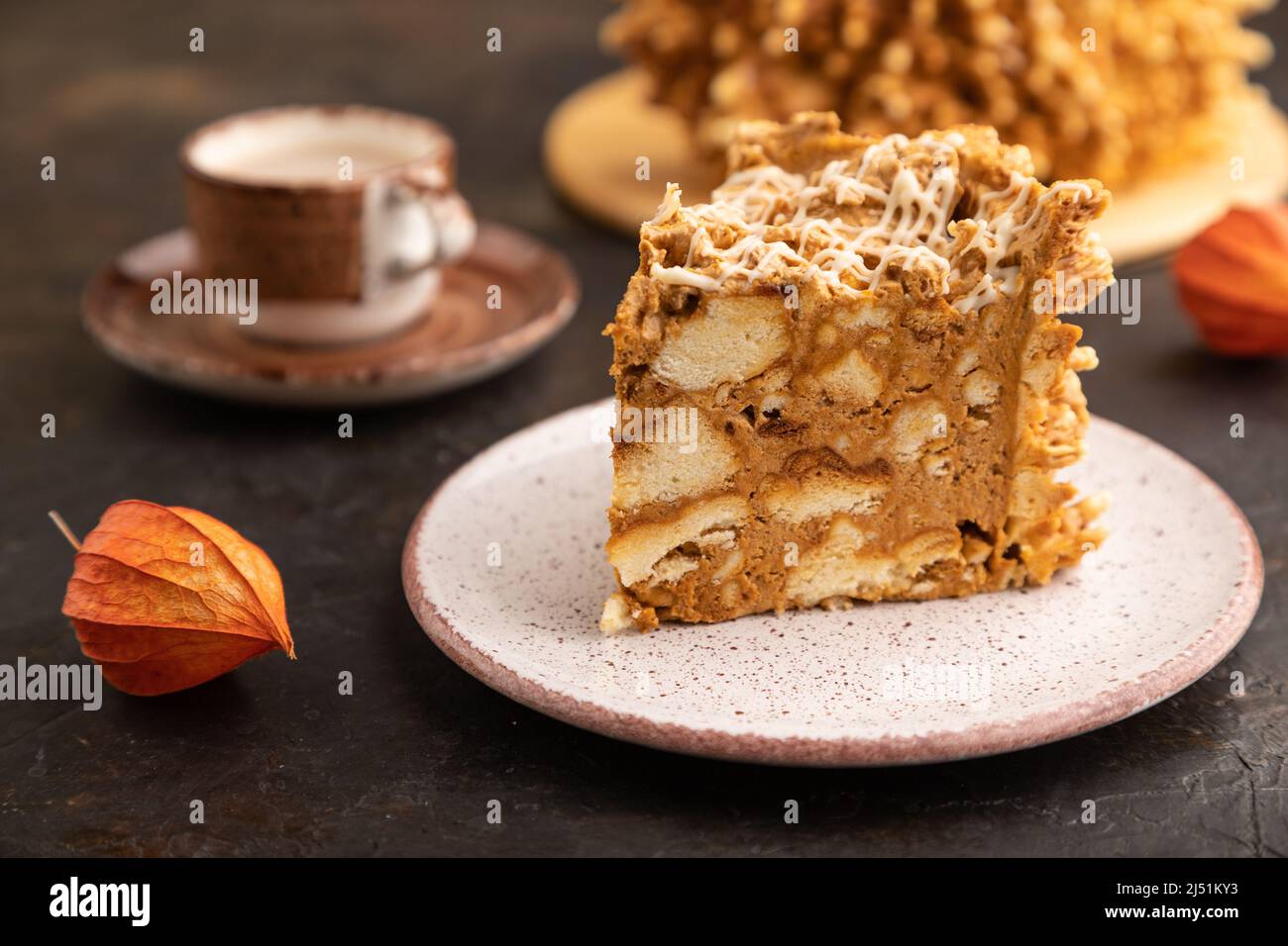 Traditional lithuanian cake shakotis with cup of coffee on black ...
