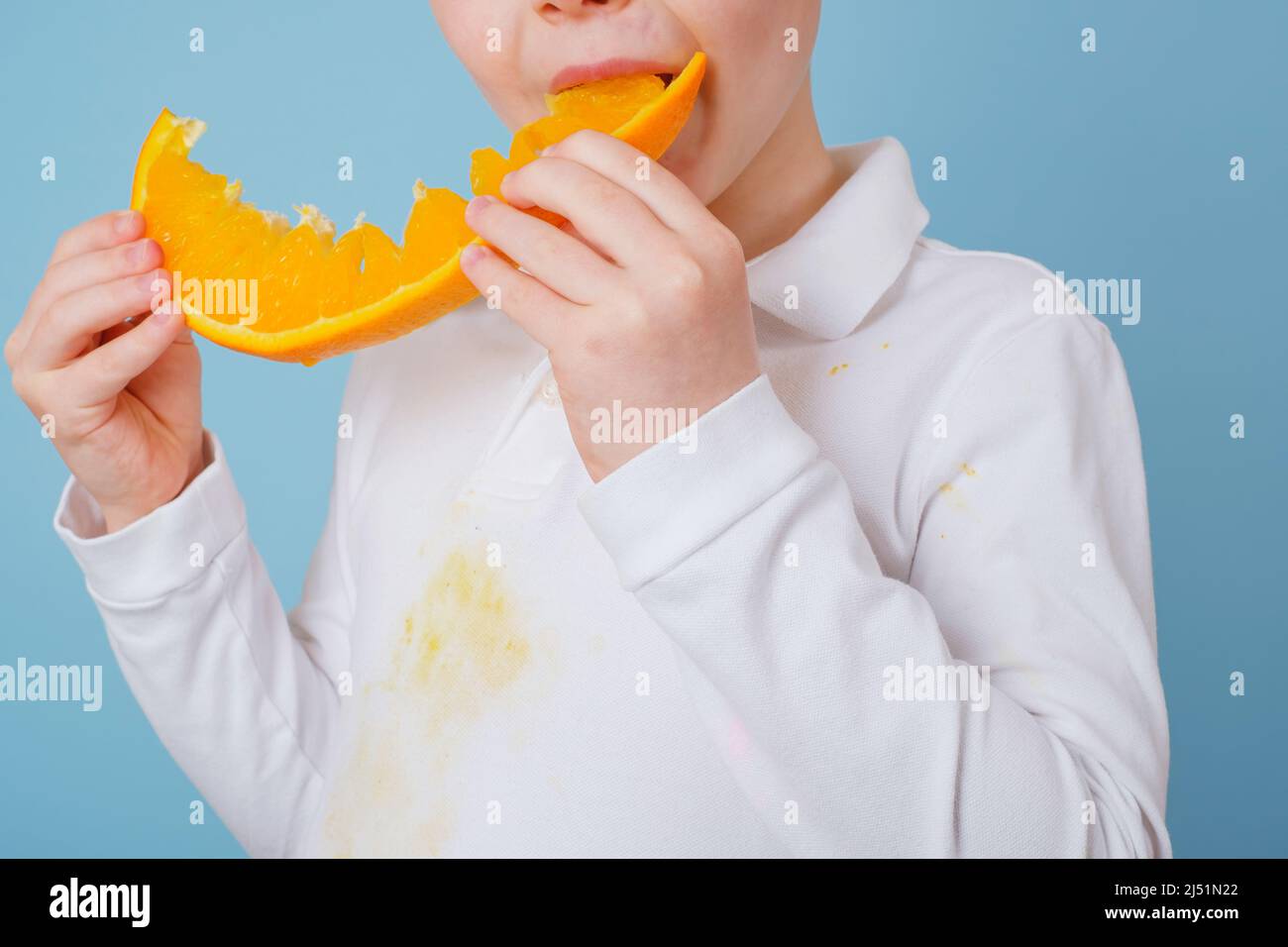 Dirty stain of orange juice on white clothes. daily life stain concept ...