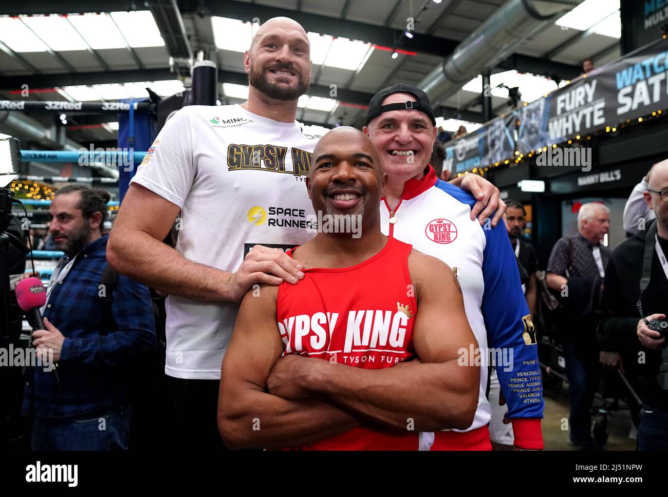 Tyson Fury (left), father John Fury (right) and trainer SugarHill ...